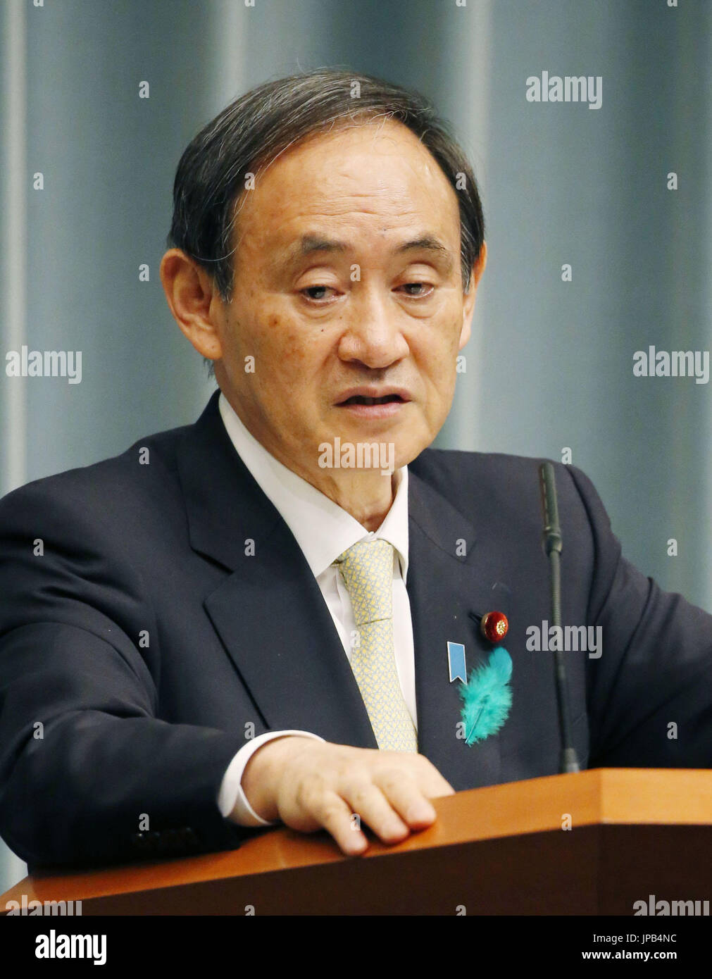 Japanese Chief Cabinet Secretary Yoshihide Suga says at a press ...