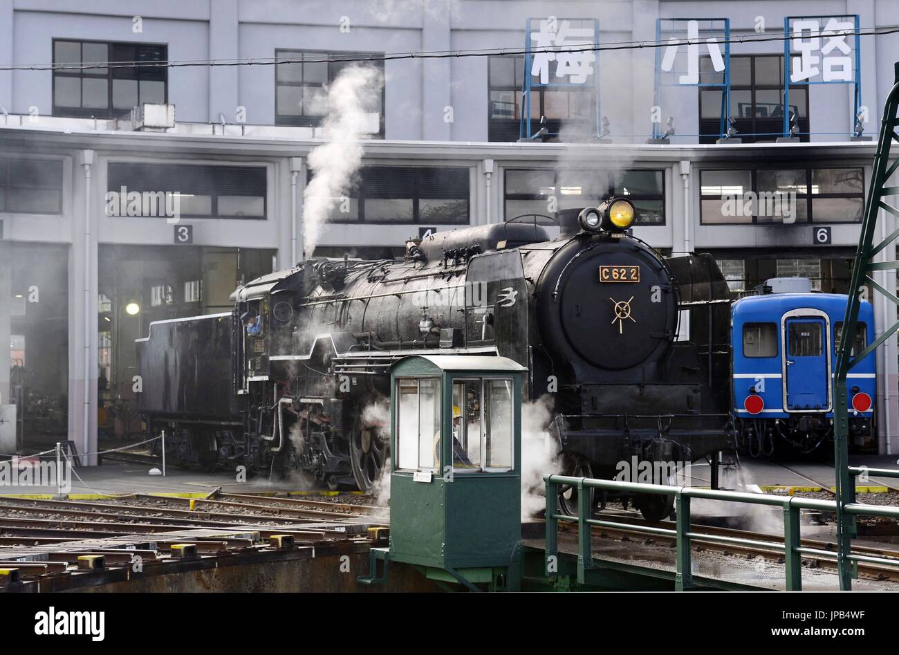 A steam locomotive, previously displayed at West Japan Railway Co.'s ...