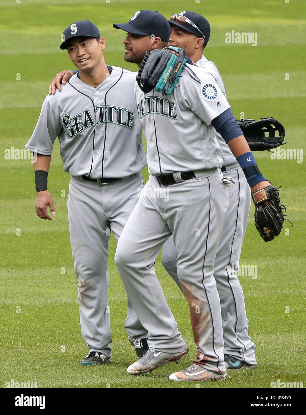 Seattle Mariners outfielders celebrate after beating the Cleveland ...