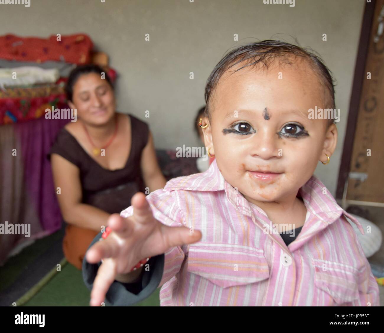 Rashmila Awal (L) and her 16-month-old son Sonish Awal are pictured in ...