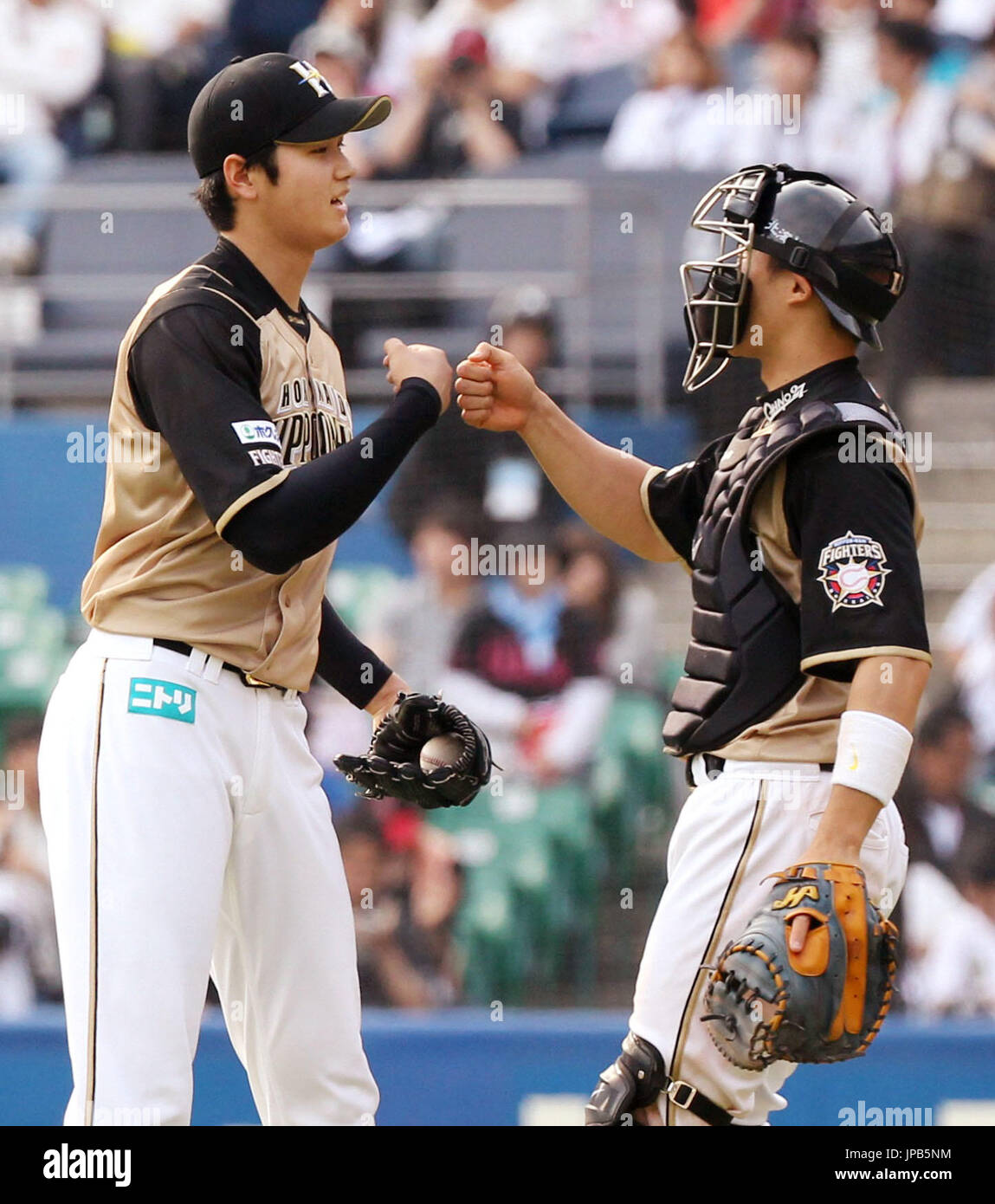 Nippon Ham Fighters pitcher Shohei Otani (L) celebrates with catcher ...