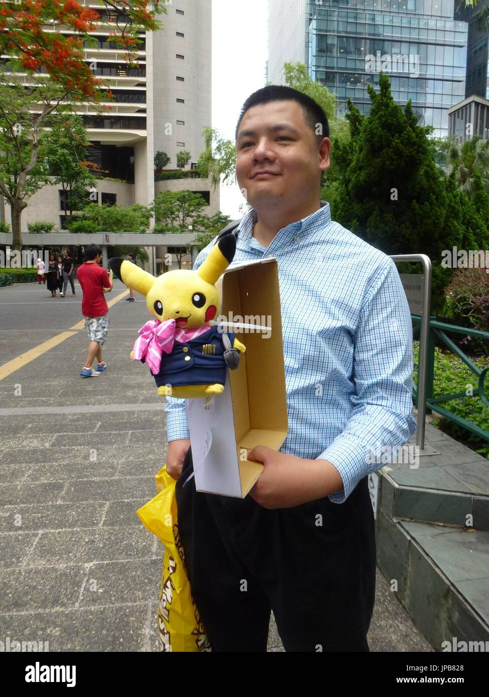 Hong Kong fans of the Japanese cartoon Pokemon protest at the Japanese ...