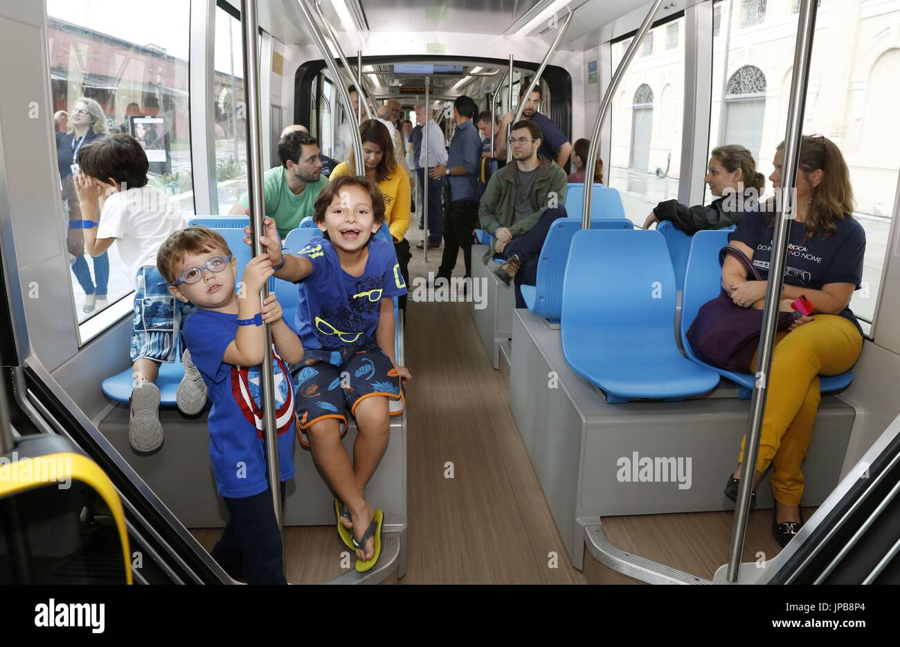 People ride a new streetcar in the Centro area, northern Rio de Janeiro ...