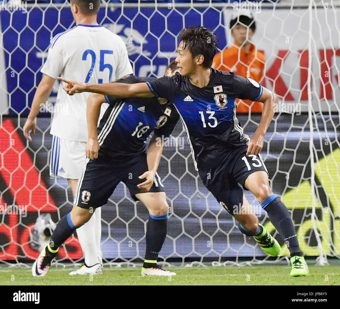 Japan's Hiroshi Kiyotake (13) celebrates after scoring the opener ...