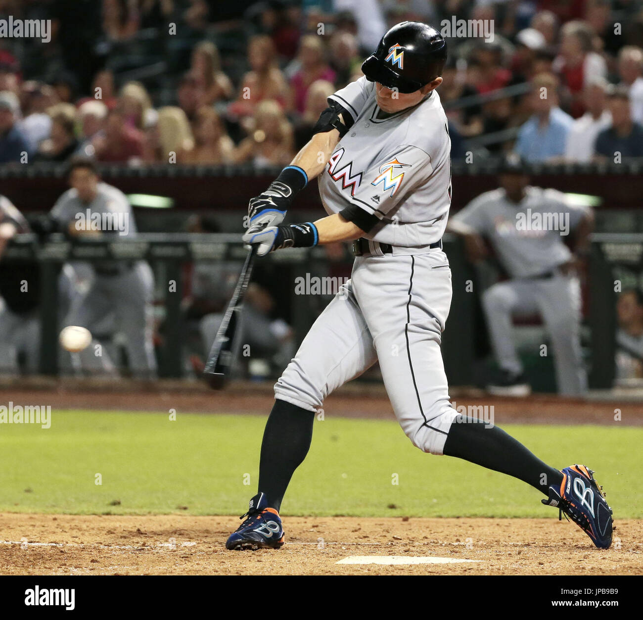 Ichiro Suzuki of the Miami Marlins hits a single as a pinch-hitter in ...