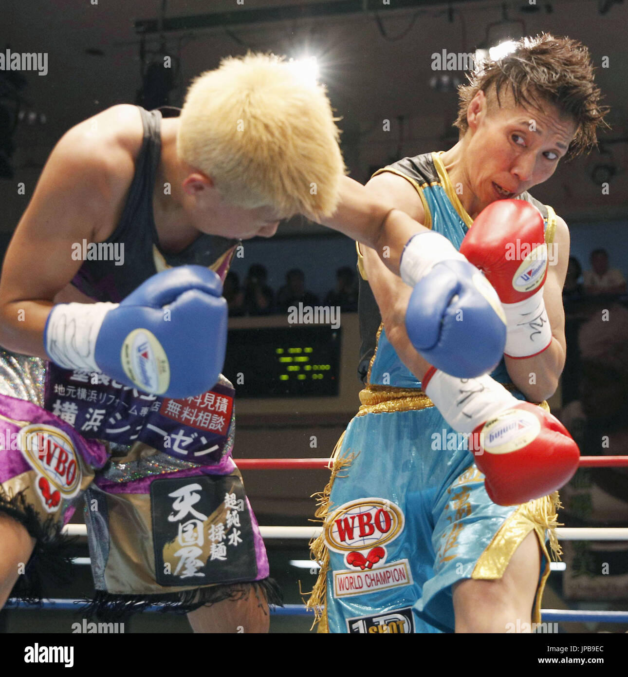 Nao Ikeyama (R) of Japan hits fellow Japanese Saemi Hanagata in the second round of a ...