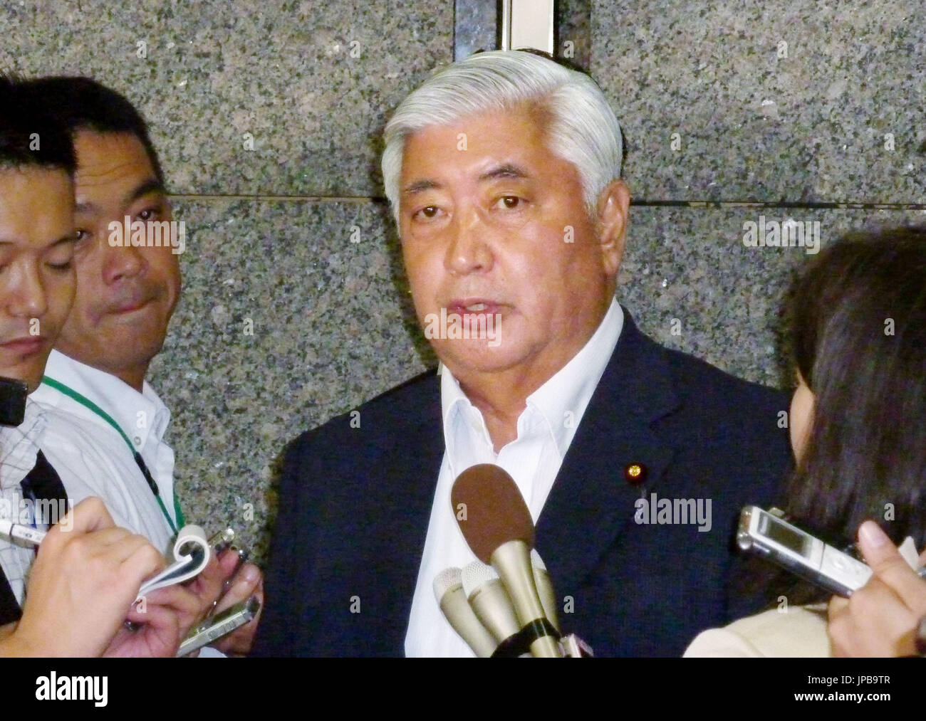 Japanese Defense Minister Gen Nakatani speaks to reporters in Tokyo on ...