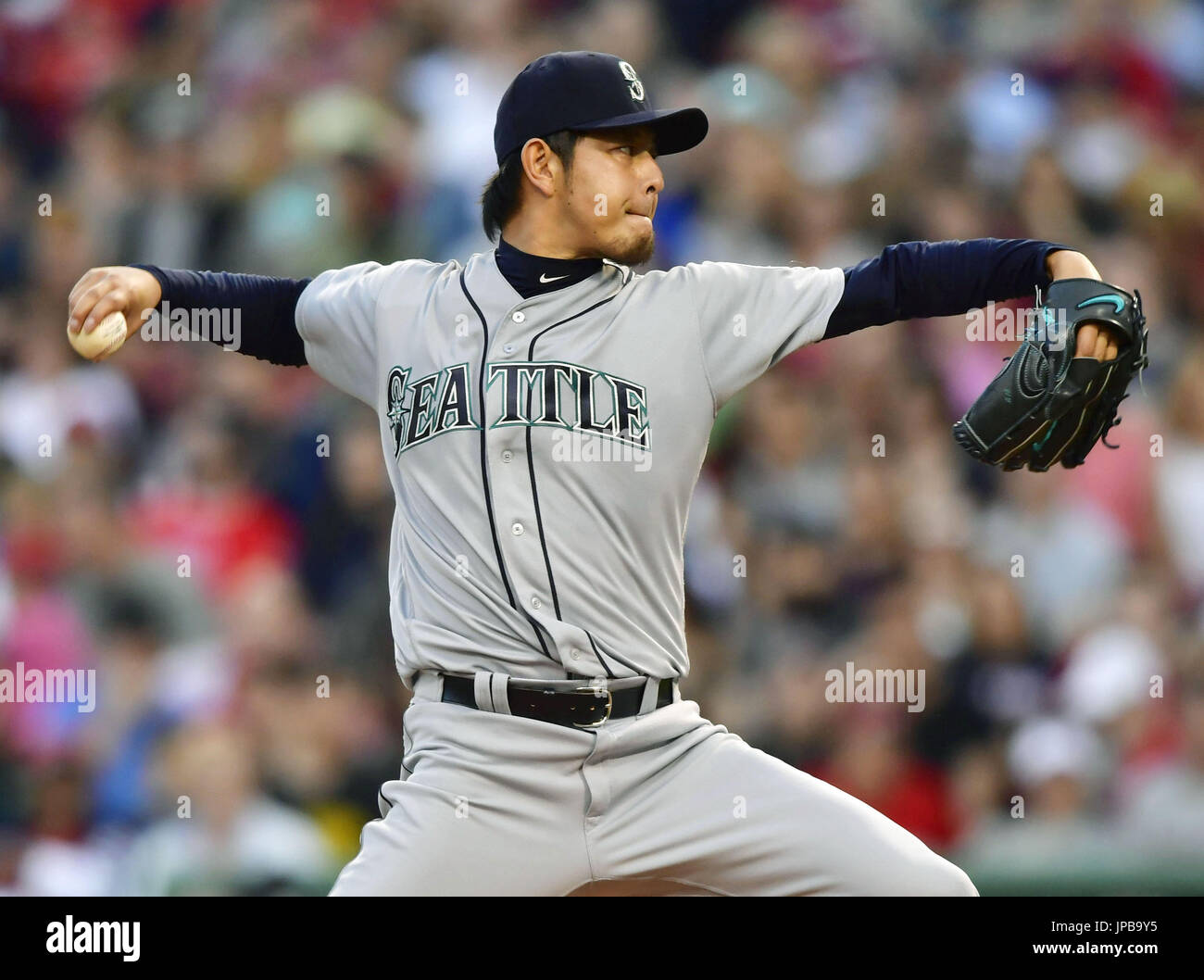 Seattle Mariners starter Hisashi Iwakuma pitches against the Boston Red ...