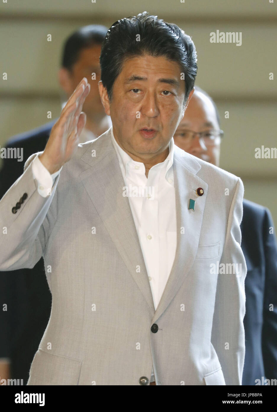 Japanese Prime Minister Shinzo Abe arrives at his office in Tokyo on ...