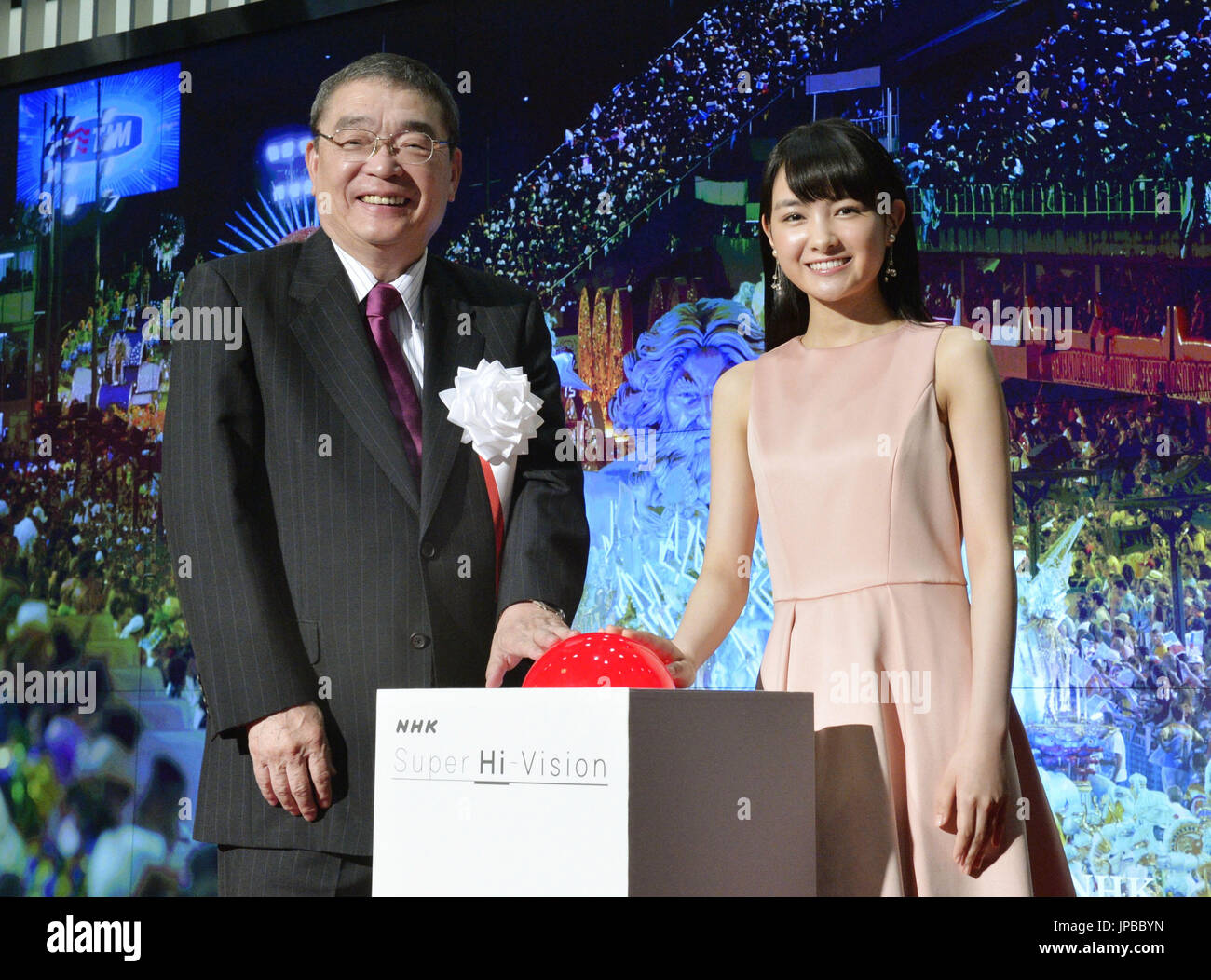 NHK President Katsuto Momii (L) poses at a commencement ceremony for 4K ...