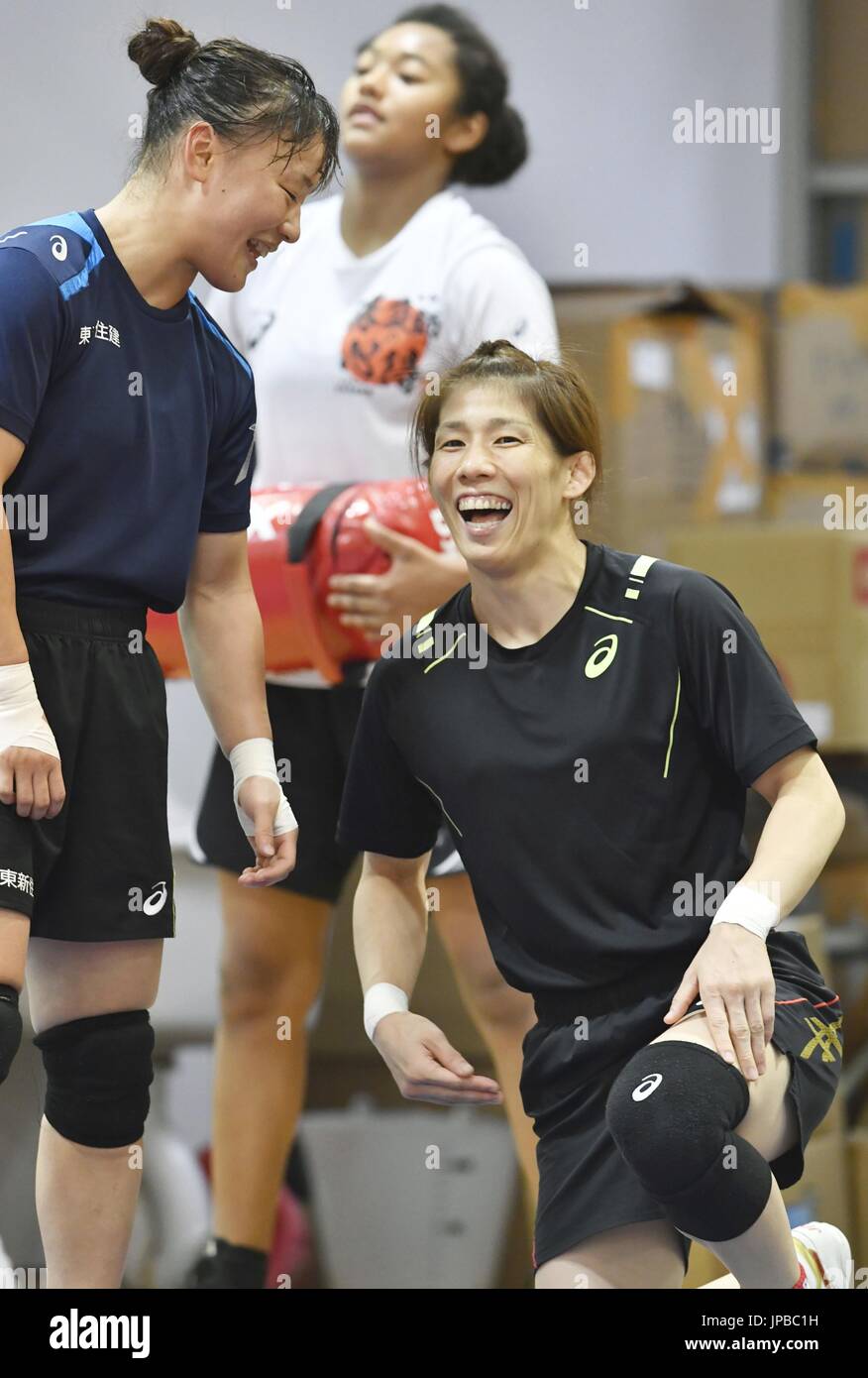 Japanese 53-kilogram class wrestler Saori Yoshida (R) and 48-kg class ...