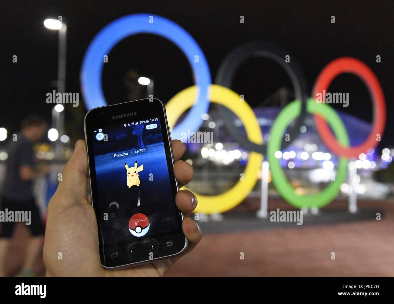 A smartphone screen shows the "Pokemon Go" mobile game in Rio de ...