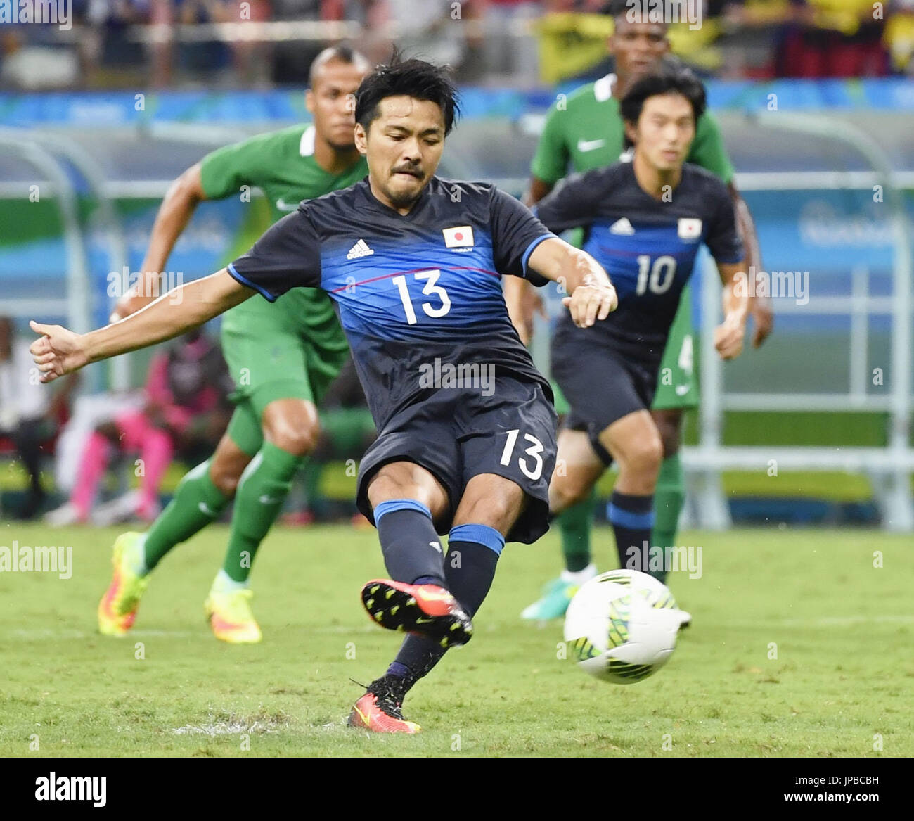 Shinzo Koroki (13) of Japan successfully converts a penalty during the ...