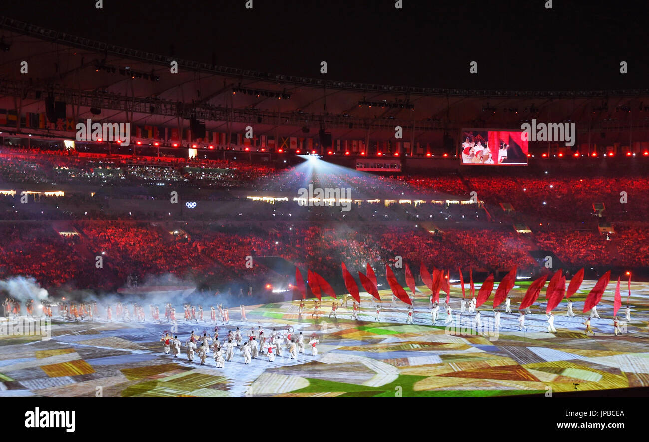 Performers set the mood for the 17-day Rio de Janeiro Olympic Games during the opening ceremony ...