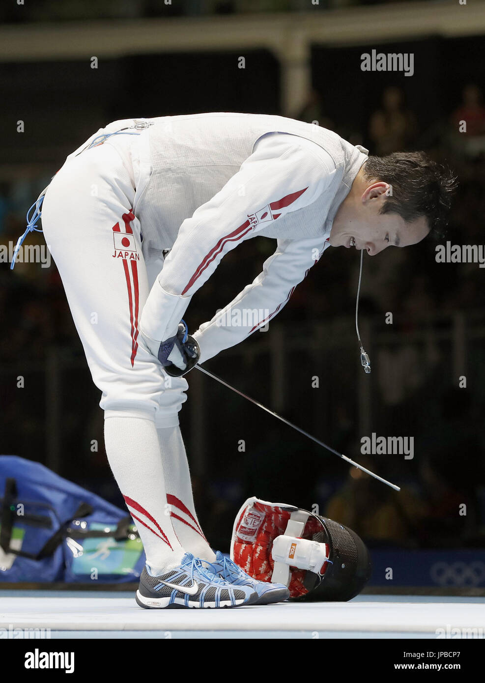 Yuki Ota, Japan's first and only fencing world champion, reacts after ...