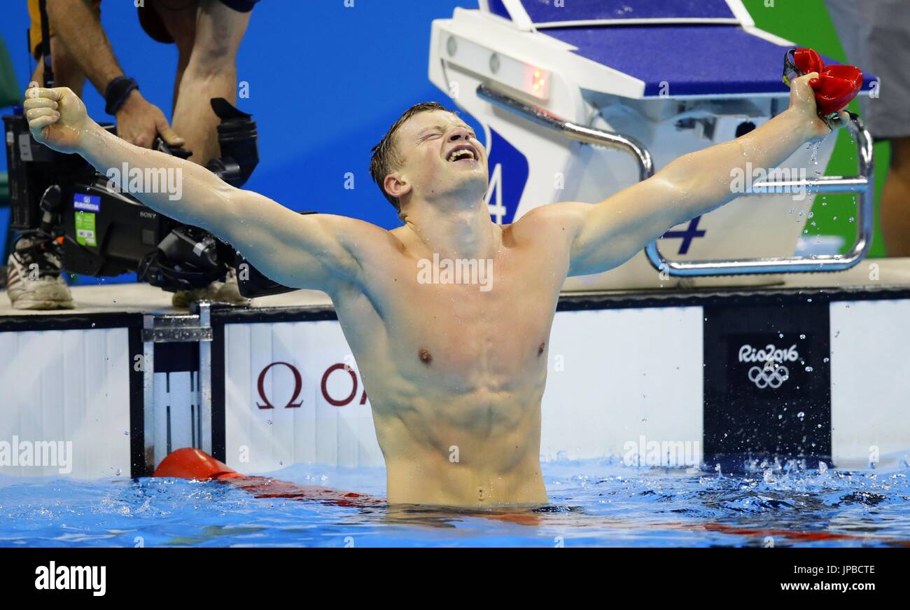 Adam Peaty of Britain celebrates after winning the men's 100-meter ...