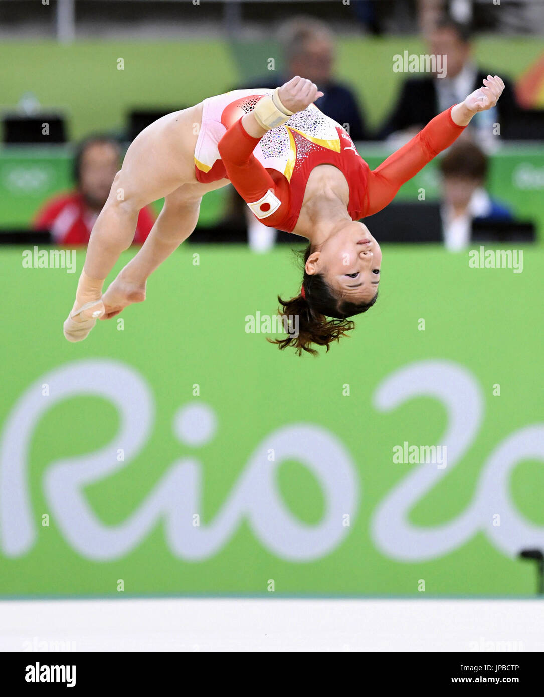 Asuka Teramoto performs her floor exercise during qualification for ...