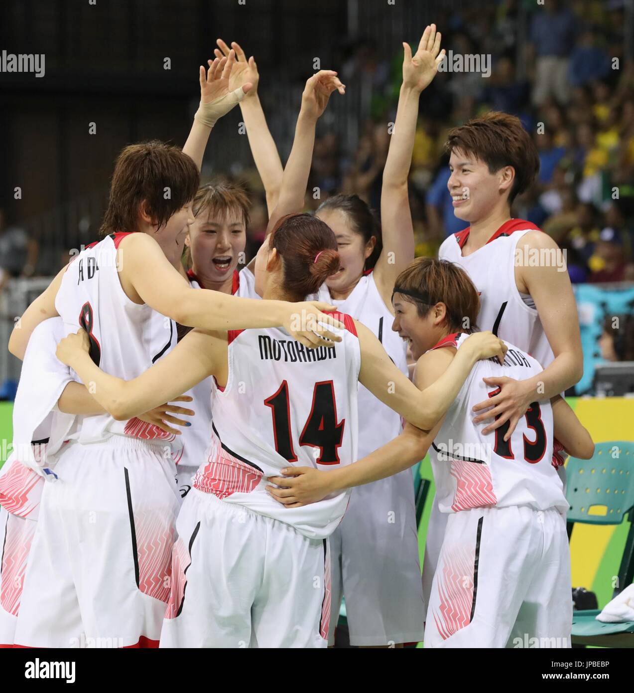 Japanese women's basketball players celebrate their 82-66 victory over ...