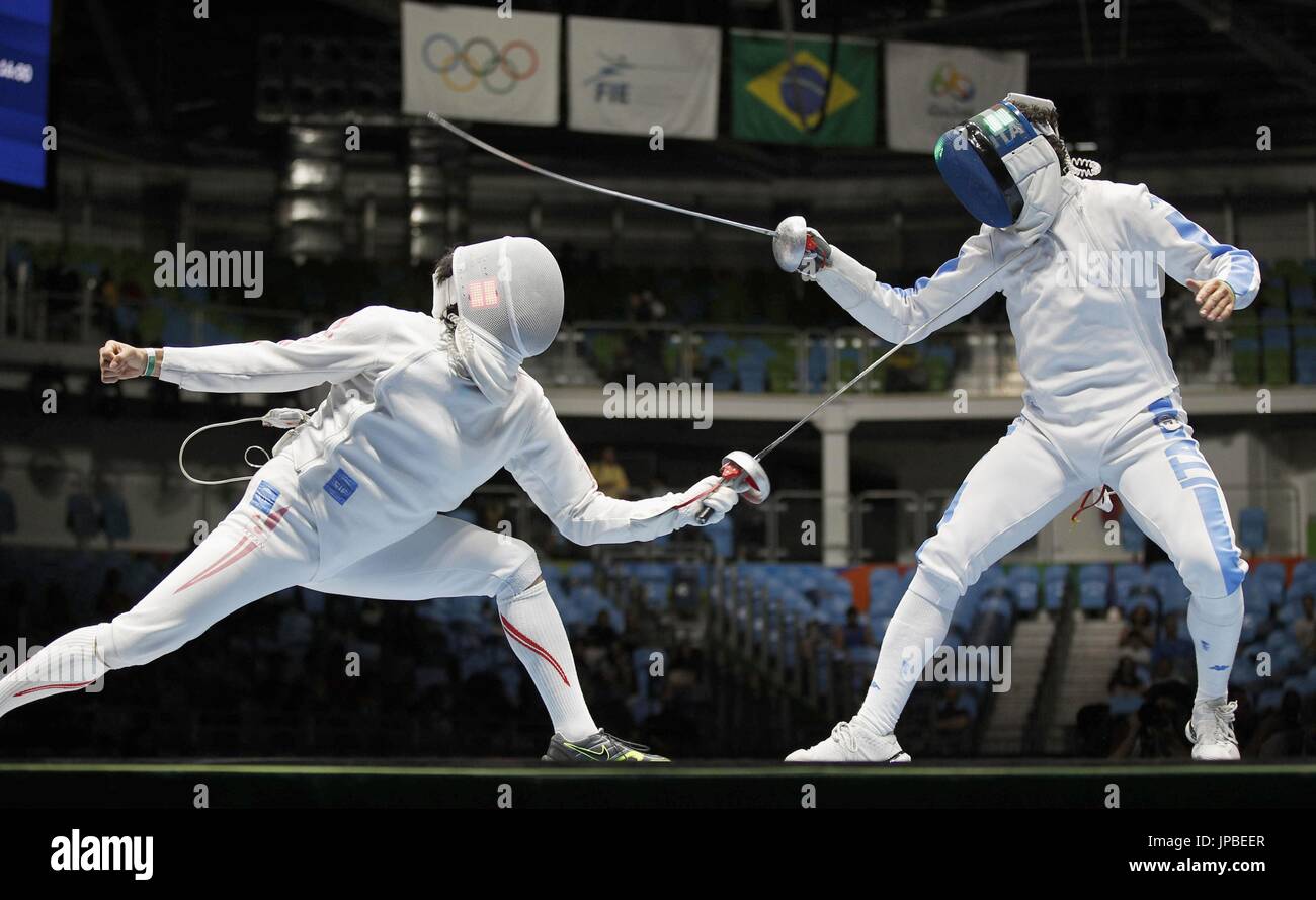 Japan's Kazuyasu Minobe (L) faces off against Marco Fichera of Italy ...