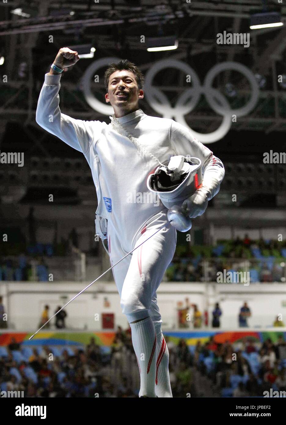 Japan's Kazuyasu Minobe celebrates after defeating Marco Fichera of ...