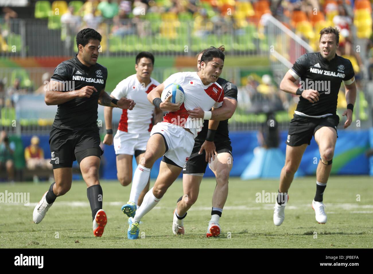 Japan and New Zealand compete during a Pool C match of men's rugby ...