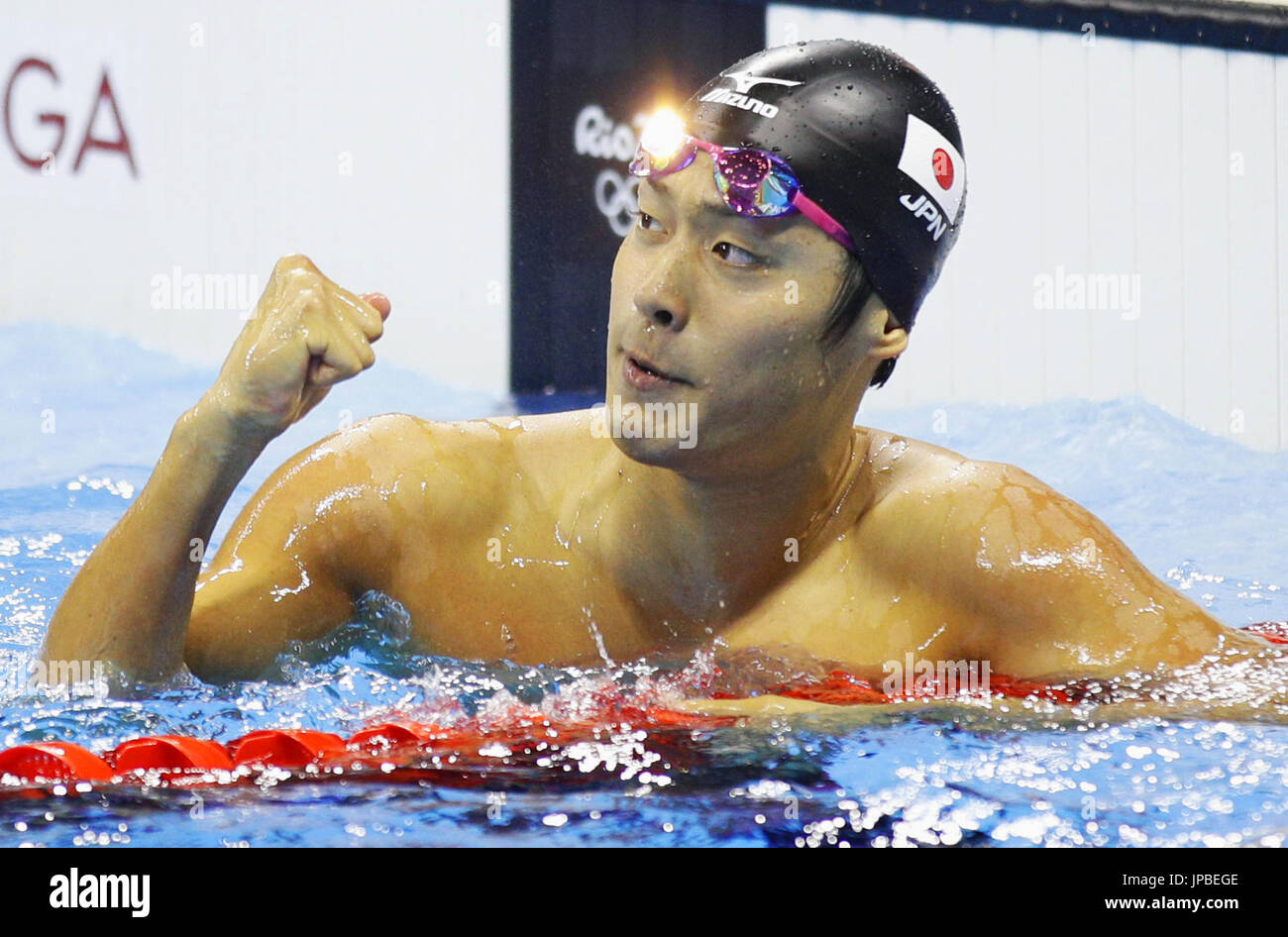 Japan's Masato Sakai pumps his fist after winning the silver medal in ...