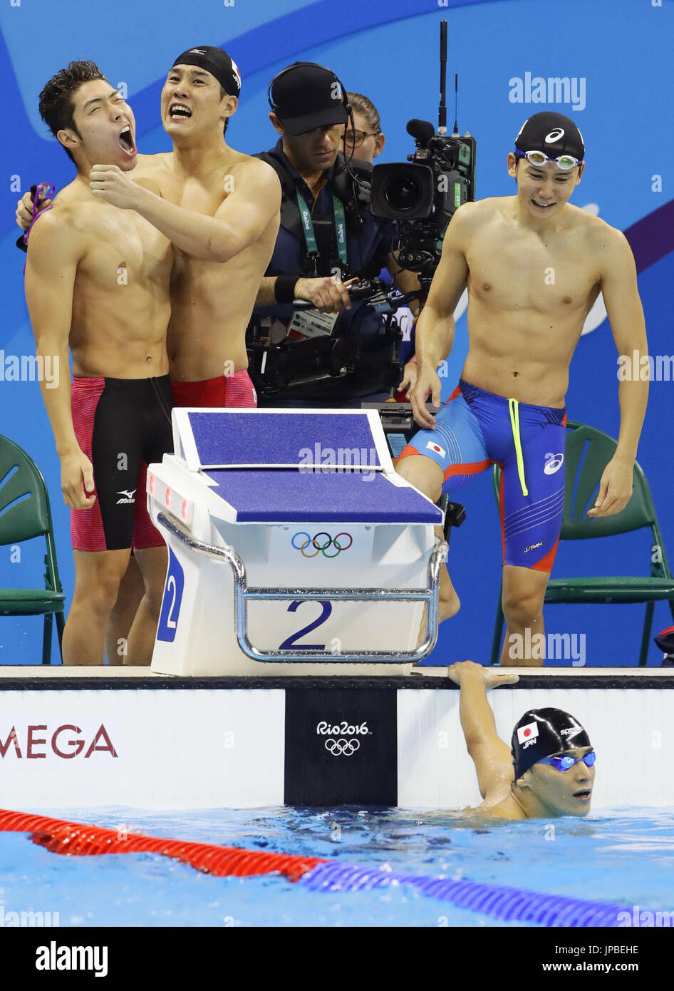 Members of the Japanese men's 4x200 meter freestyle relay team -- (From ...