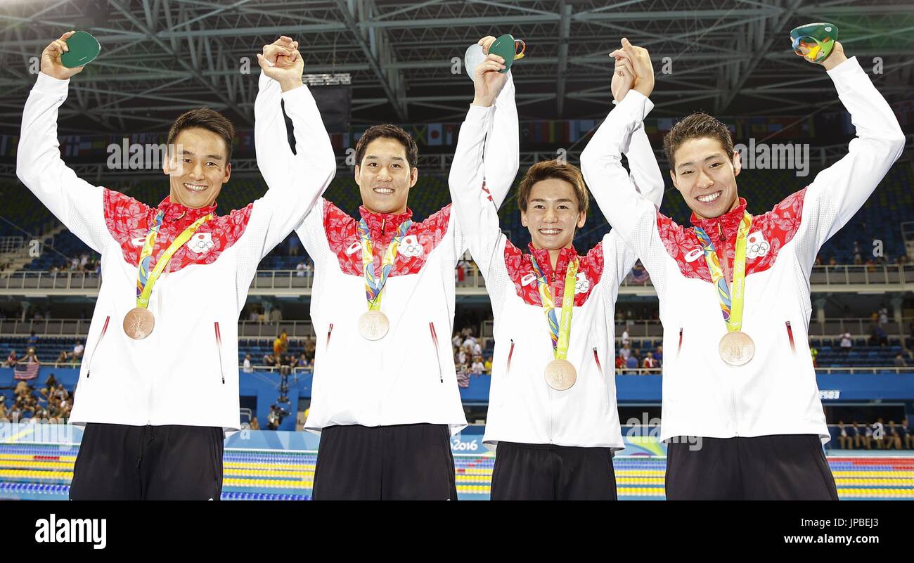 Members of the Japanese men's 4x200 meter freestyle relay team -- (From ...