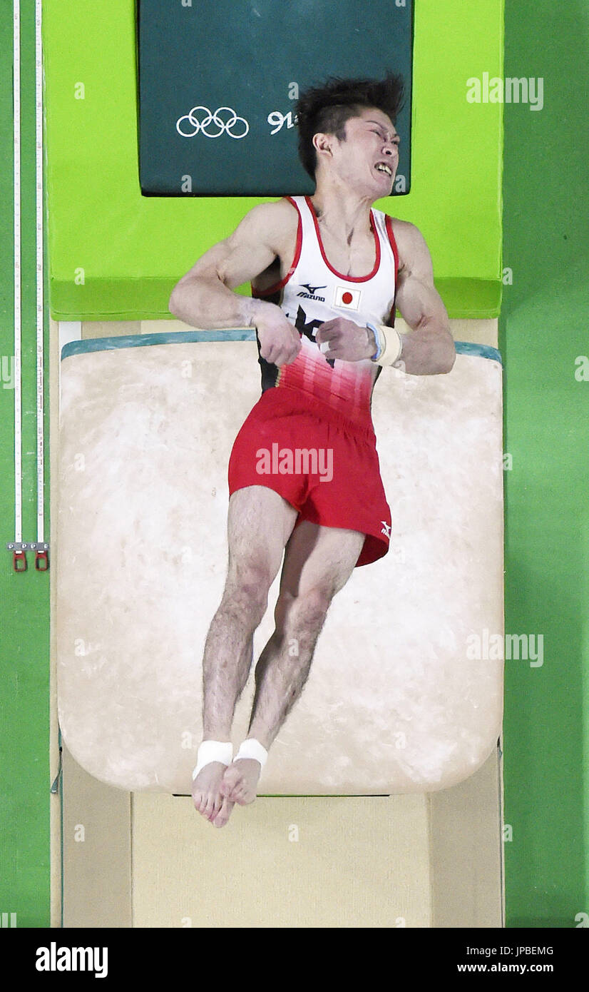 Kohei Uchimura performs the vault routine on his way to winning the men ...