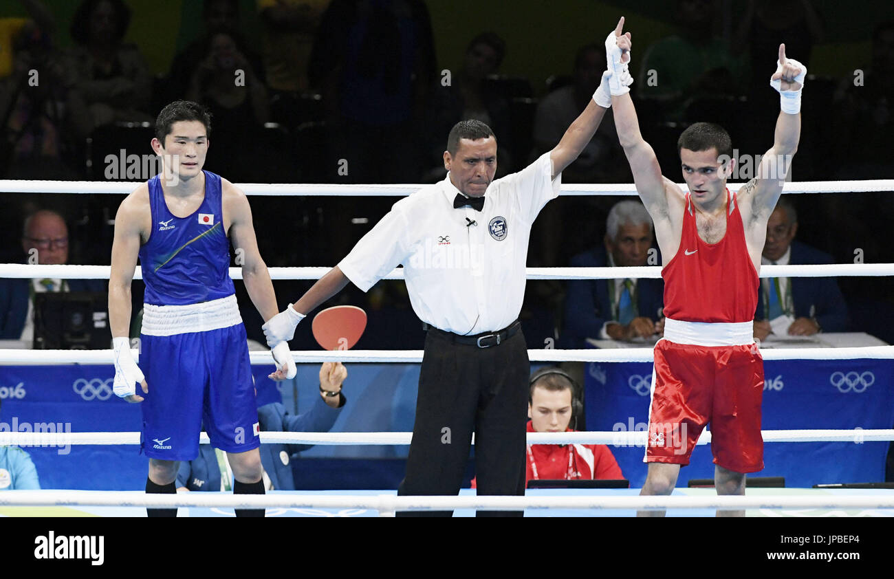Aram Avagyan of Armenia (R) wins a split decision over Japan's Arashi ...