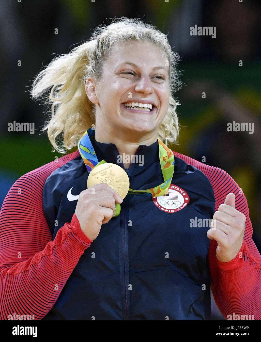 American judoka Kayla Harrison poses with her gold medal after winning ...