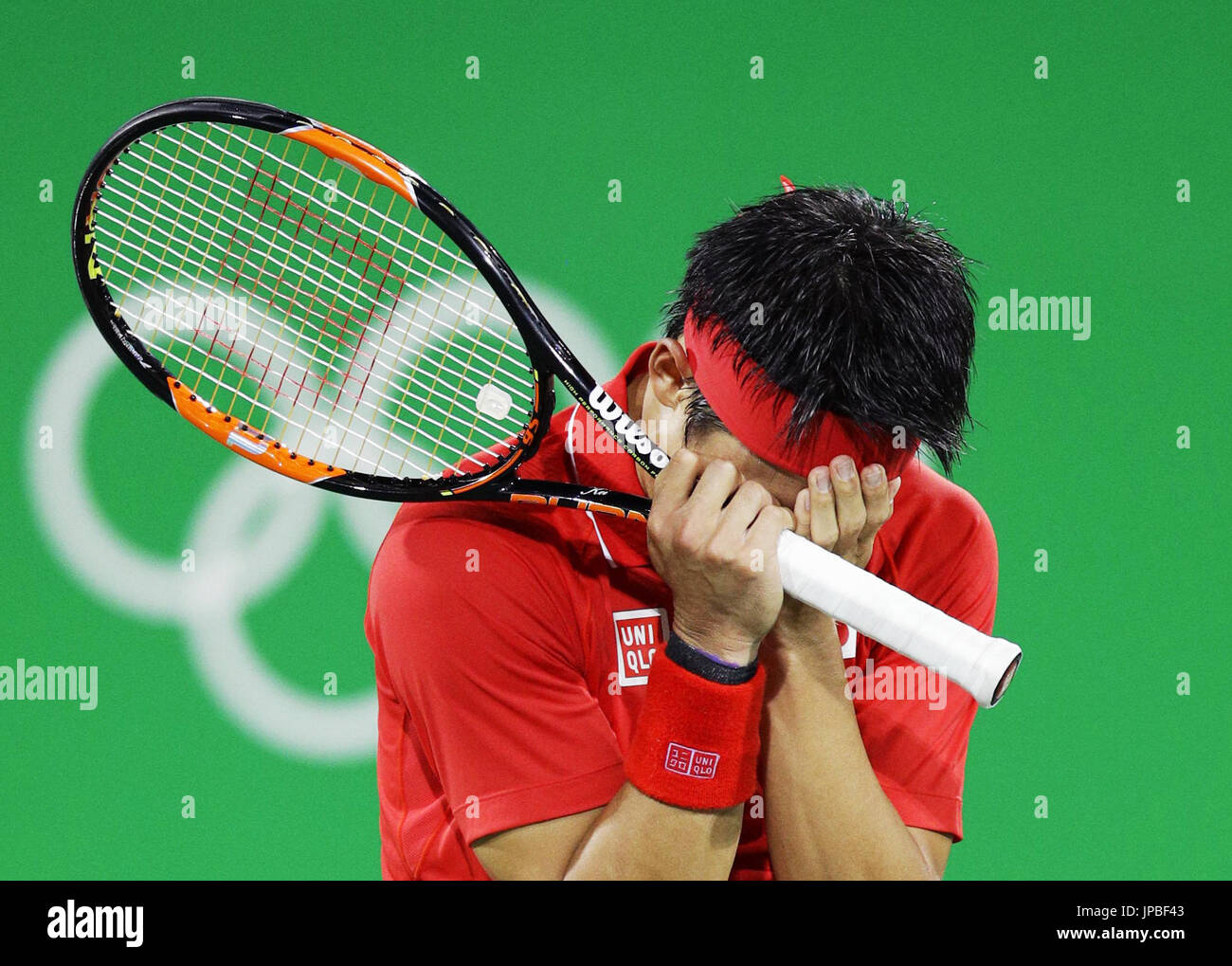 Kei Nishikori of Japan reacts after saving three match points to defeat ...