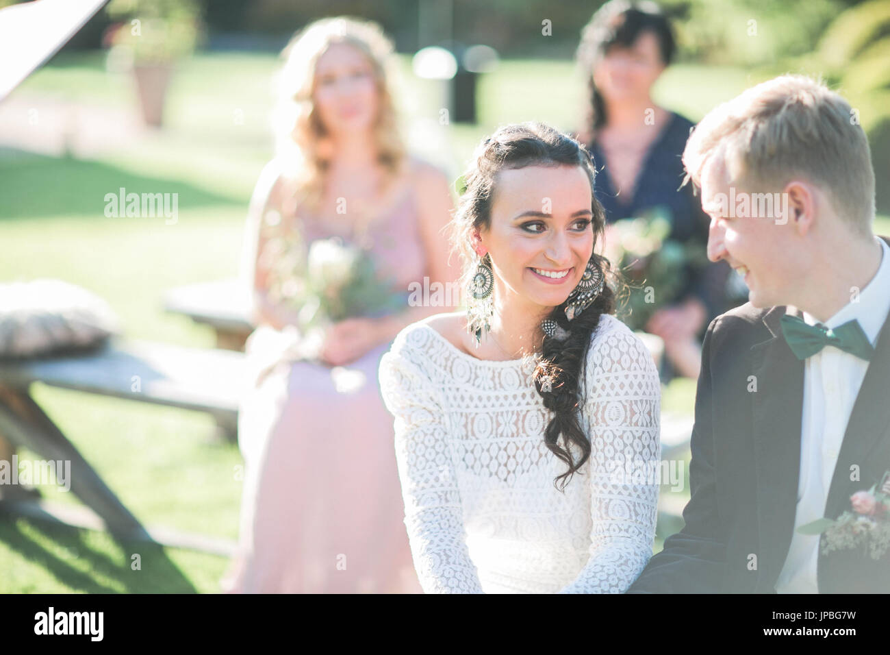 Bridal couple at wedding outside, portrait Stock Photo - Alamy