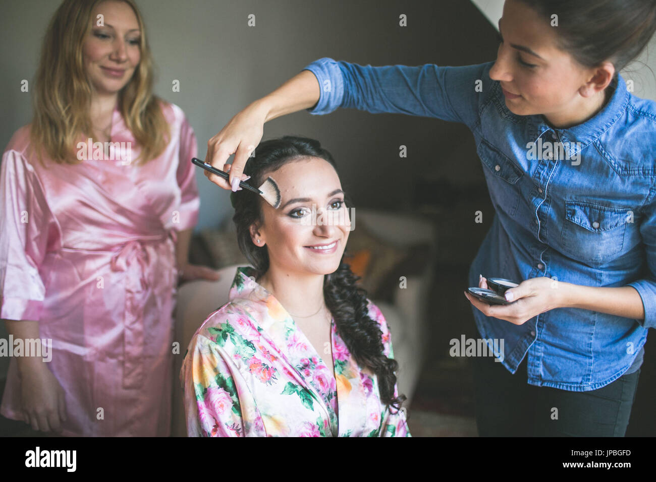 Woman being made up hi-res stock photography and images - Alamy