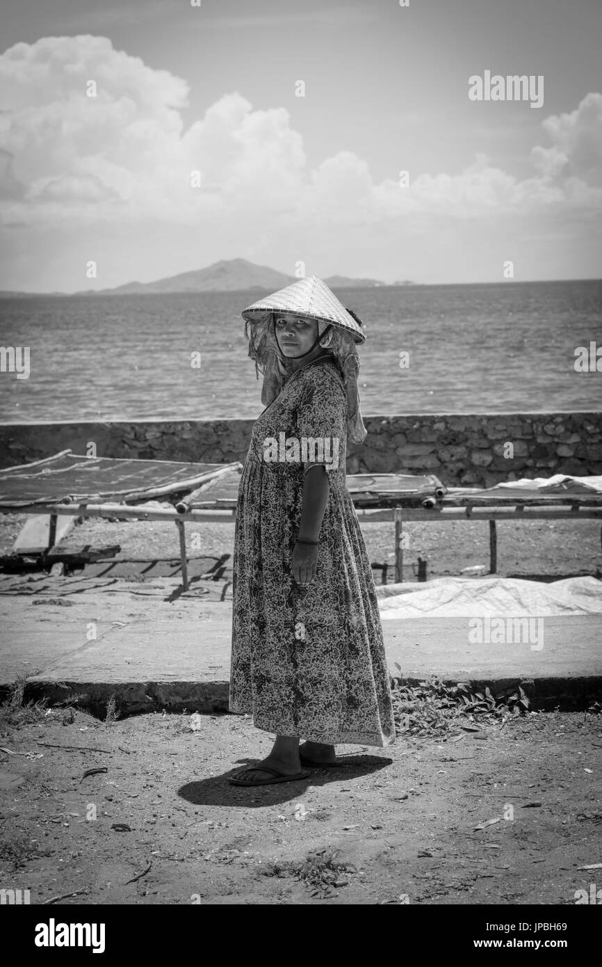 Asian woman portrait after work, Indonesia, Pulau Rinca, traditional ...