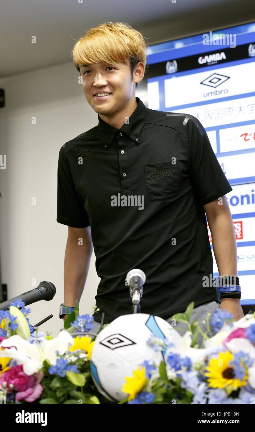 Japan forward Takashi Usami attends a press conference in the western ...