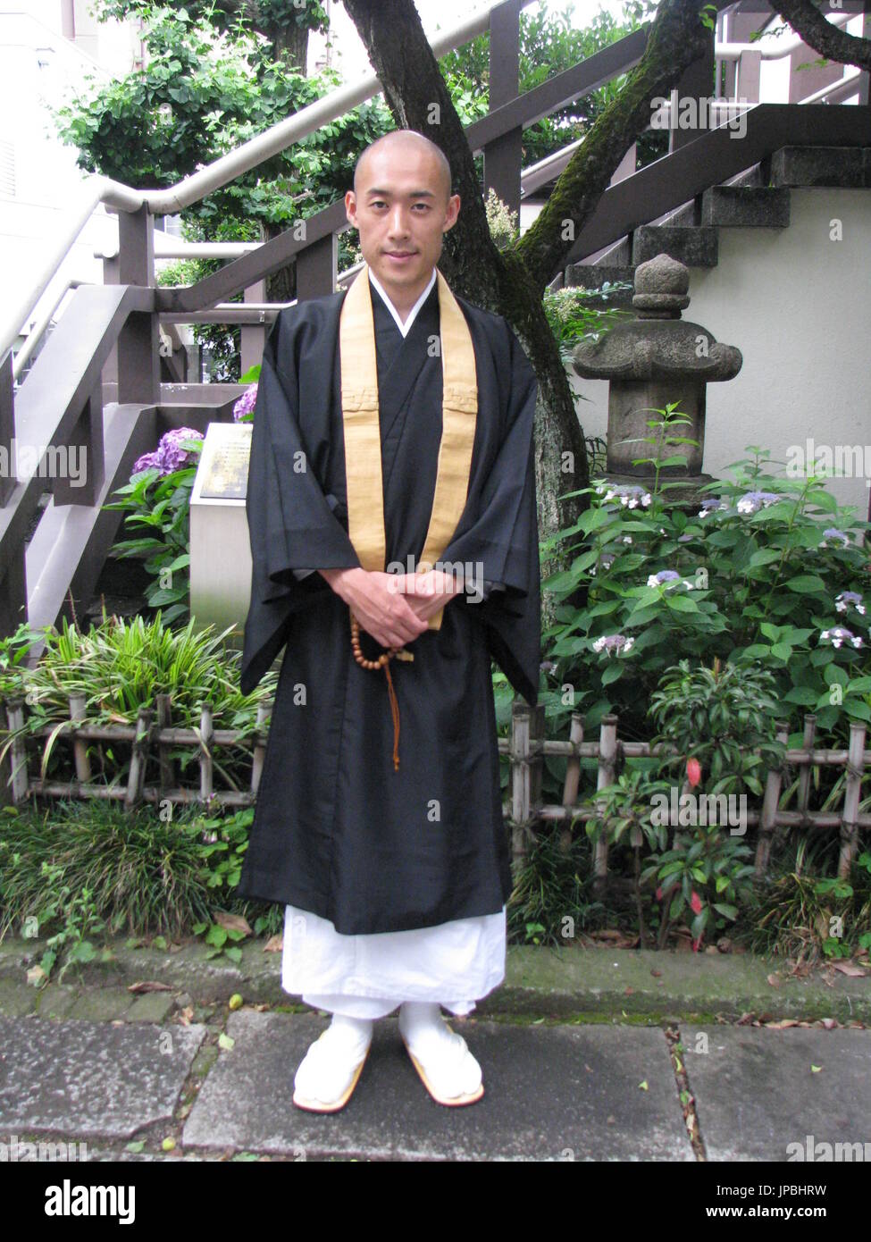 Buddhist monk Shoukei Matsumoto is seen after a full day's work at ...
