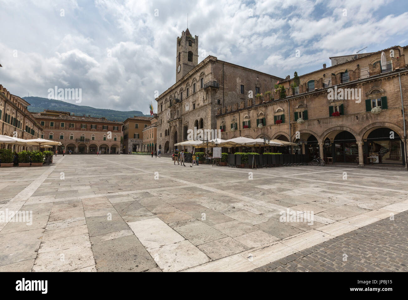 The old arcades frame the historical buildings of Piazza del Popolo ...