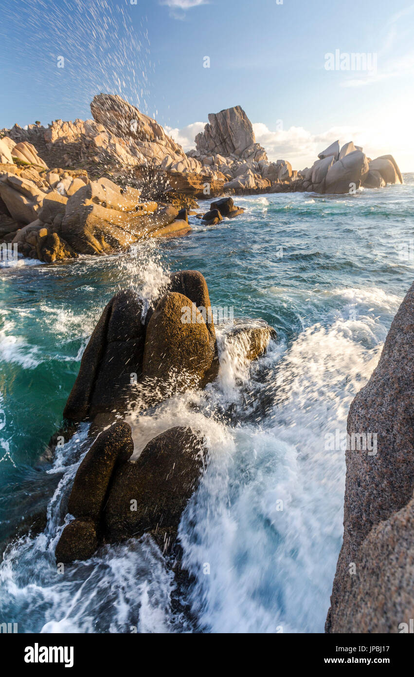 Waves crashing on cliffs at sunset Capo Testa Santa Teresa di Gallura ...