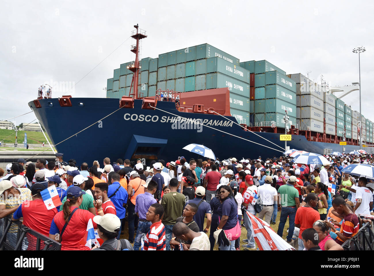 Spectators watch as the Chinese container ship Cosco Shipping Panama ...