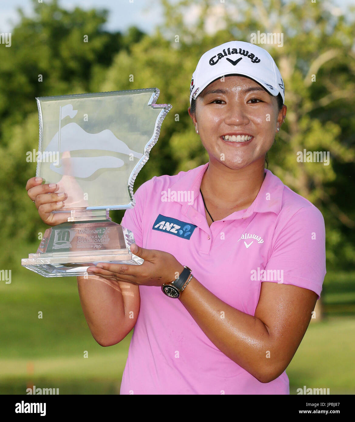 Lydia Ko of New Zealand poses with the winner's trophy after her ...