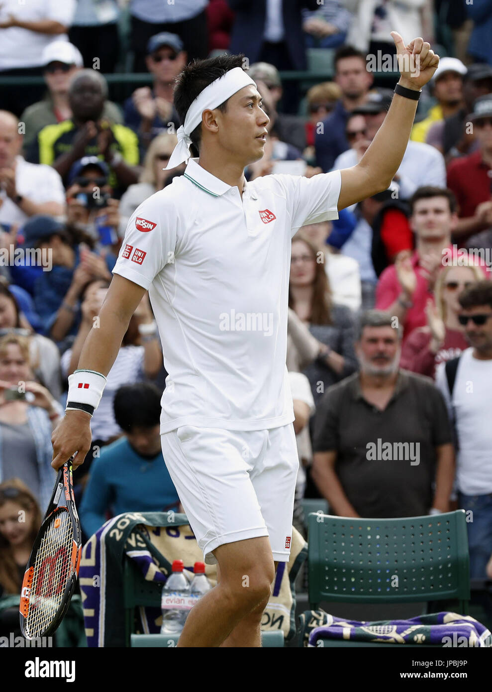 Japan's Kei Nishikori acknowledges the crowd after defeating Sam Groth ...