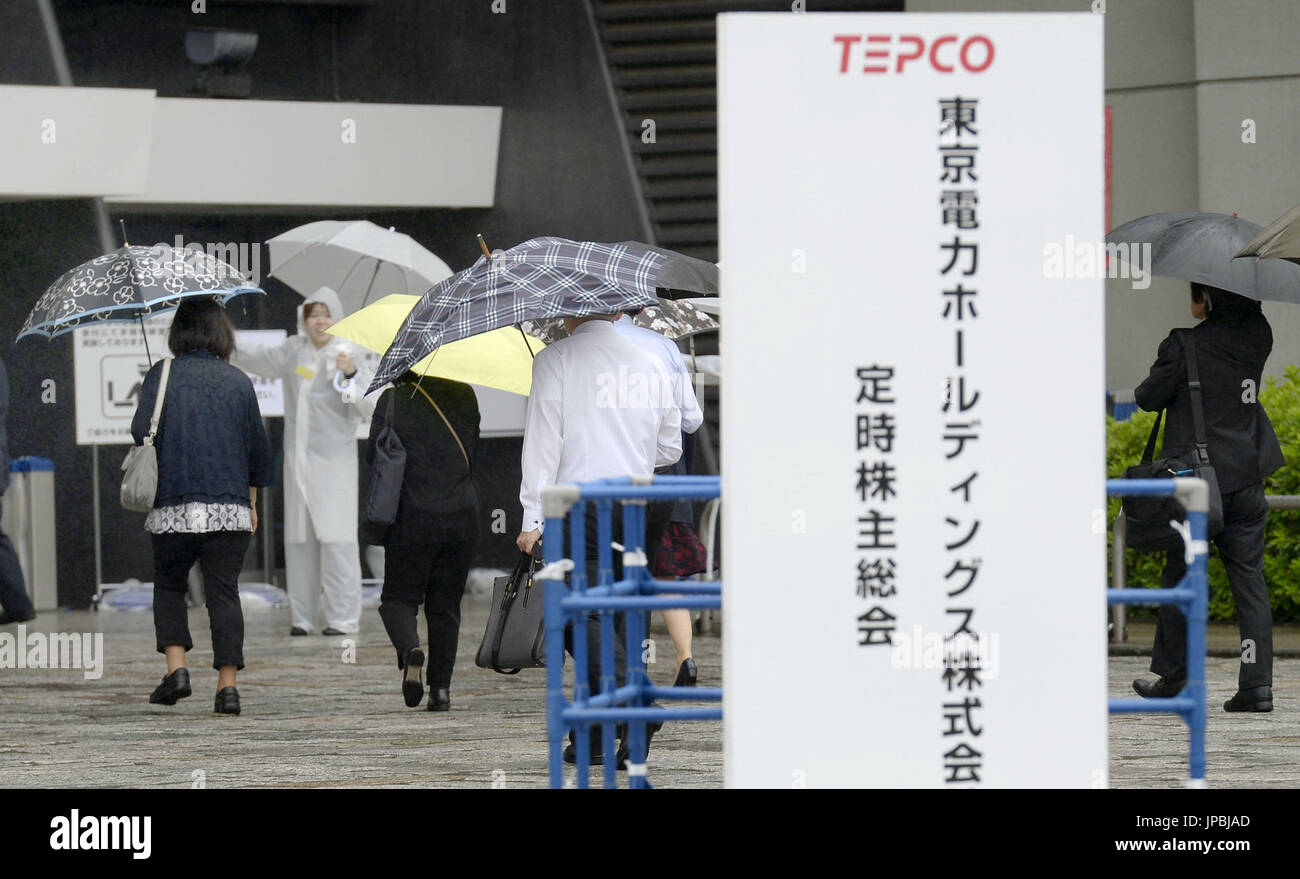 Shareholders in Tokyo Electric Power Company Holdings Inc. head to the ...