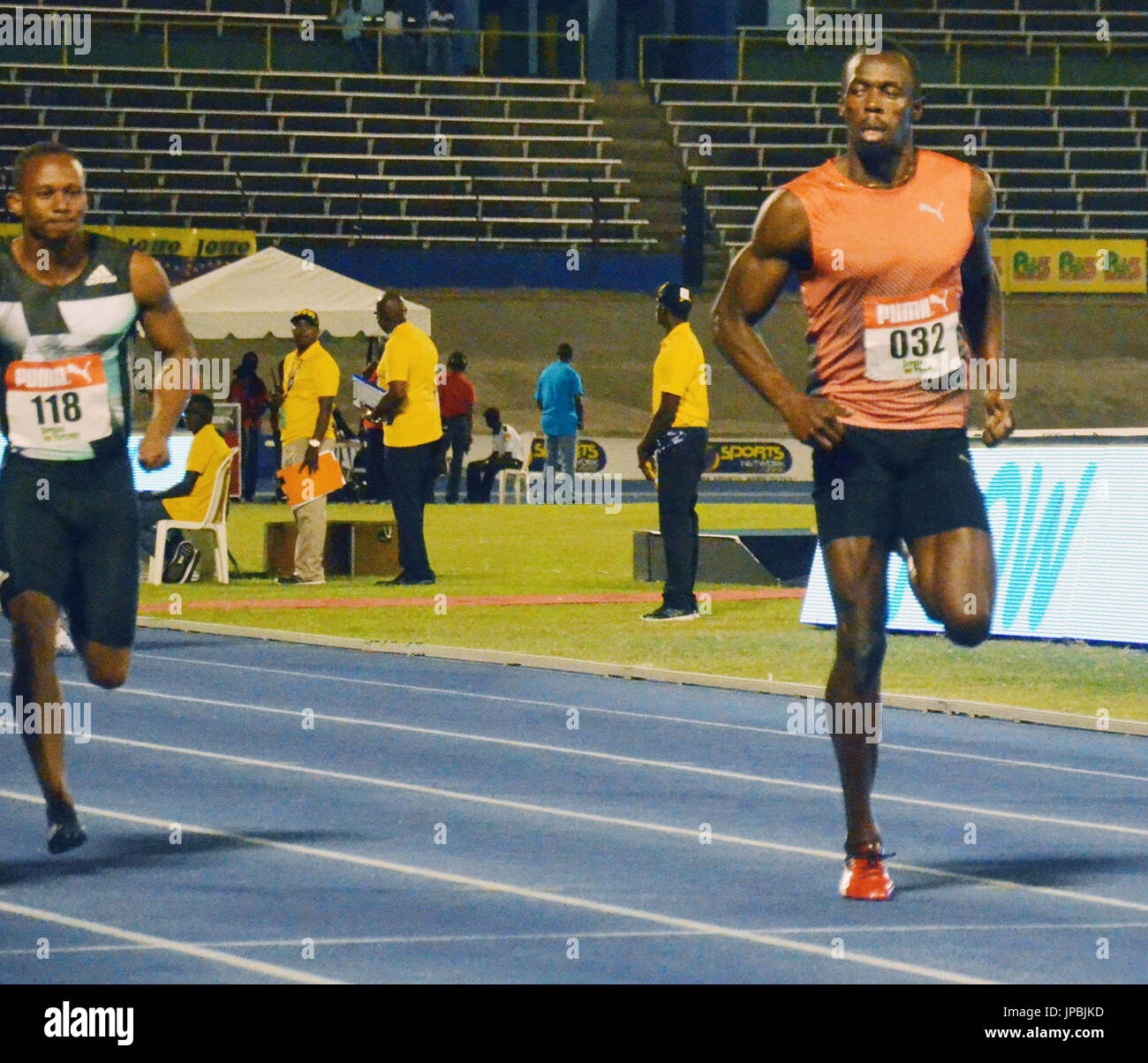 Olympic sprint champion Usain Bolt (R) qualifies for the men's 100 ...