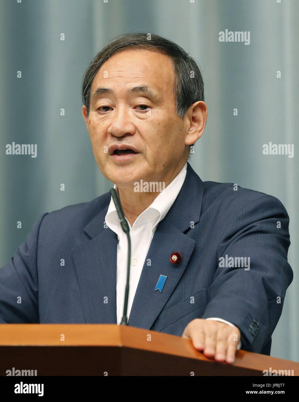 Chief Cabinet Secretary Yoshihide Suga attends a press conference in ...