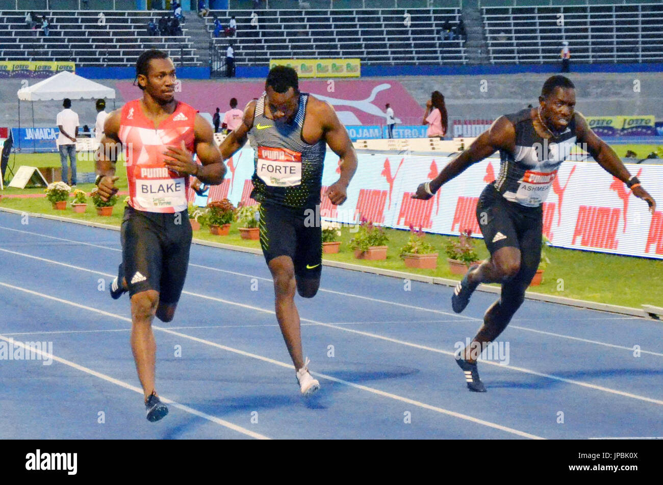 Sprinter Yohan Blake (L) wins the men's 200 meters in Jamaica's senior ...