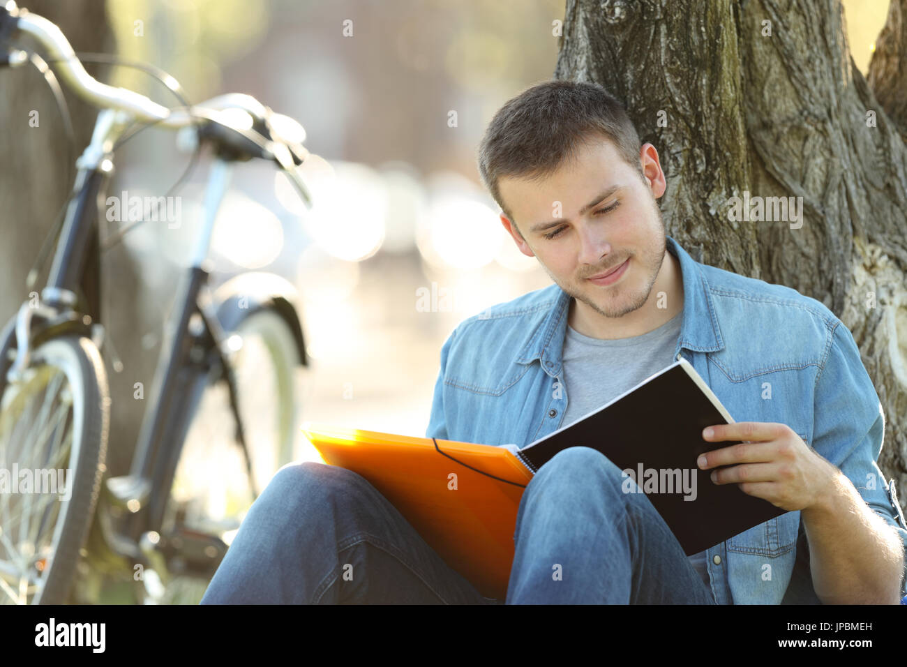 Teen reading school book class hi-res stock photography and images - Alamy