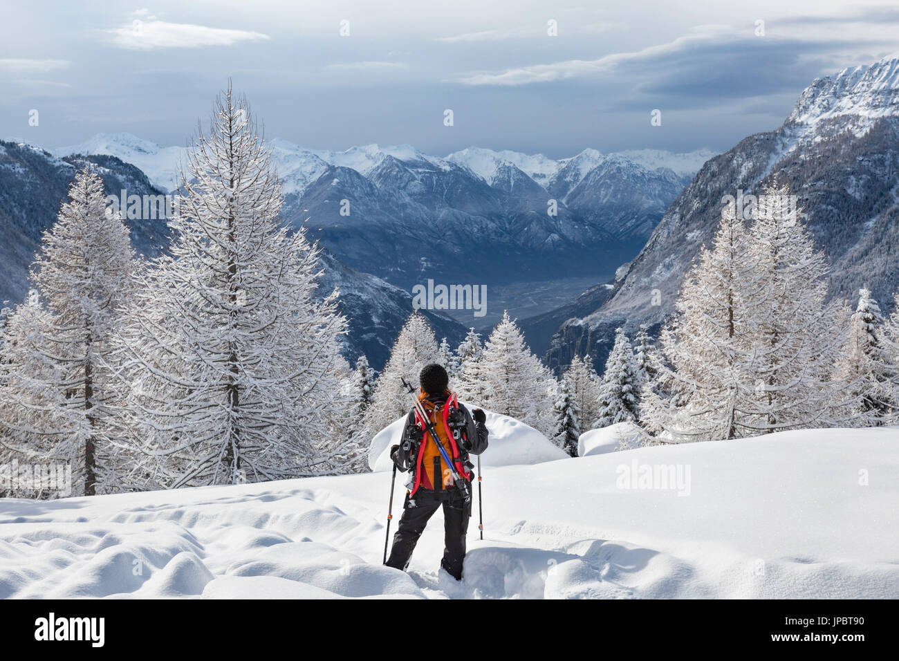A girl is resting during the walk in Alp Astolo (Alp Astolo, Varzo ...