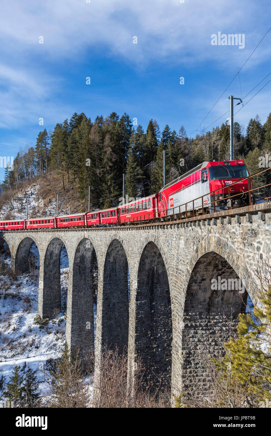 Bernina express red train along schmittentobel viaduct filisur hi-res ...