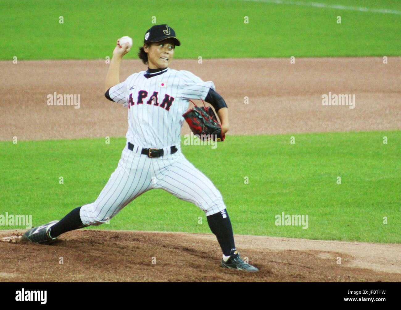 Ayami Sato of Japan starts the Women's Baseball World Cup final against ...